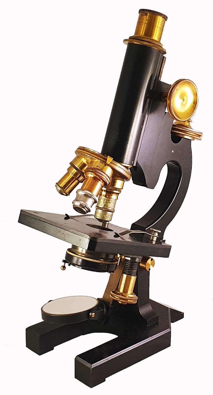 A close-up of a microscopeDescription automatically generated