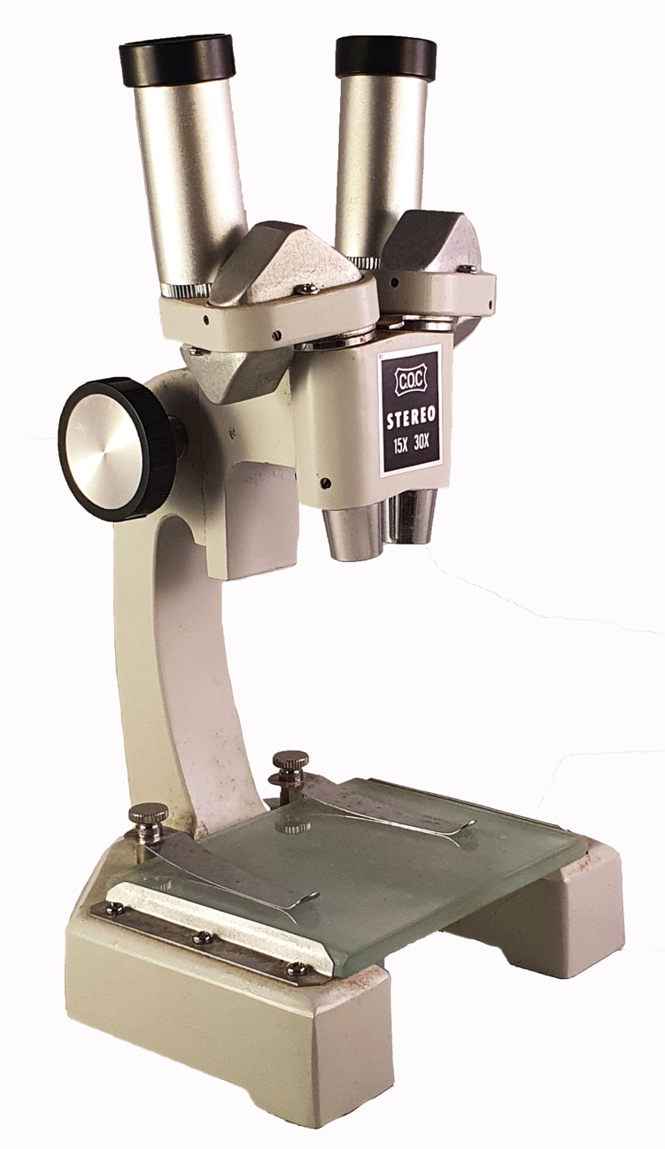 A close-up of a microscopeDescription automatically generated