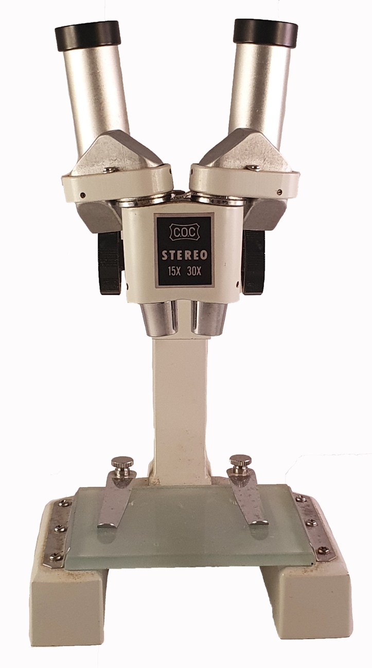 A close-up of a microscopeDescription automatically generated with ...