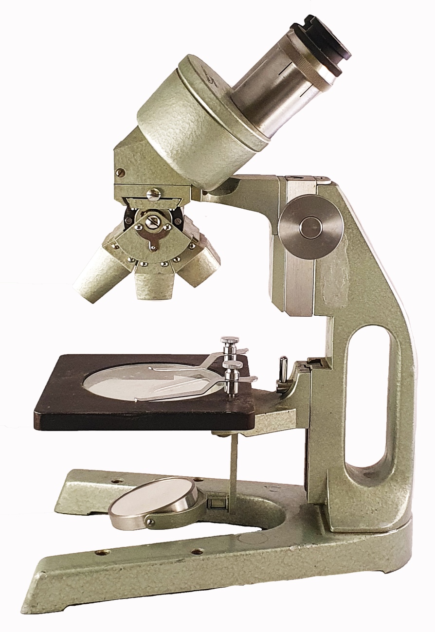 A close-up of a microscopeDescription automatically generated