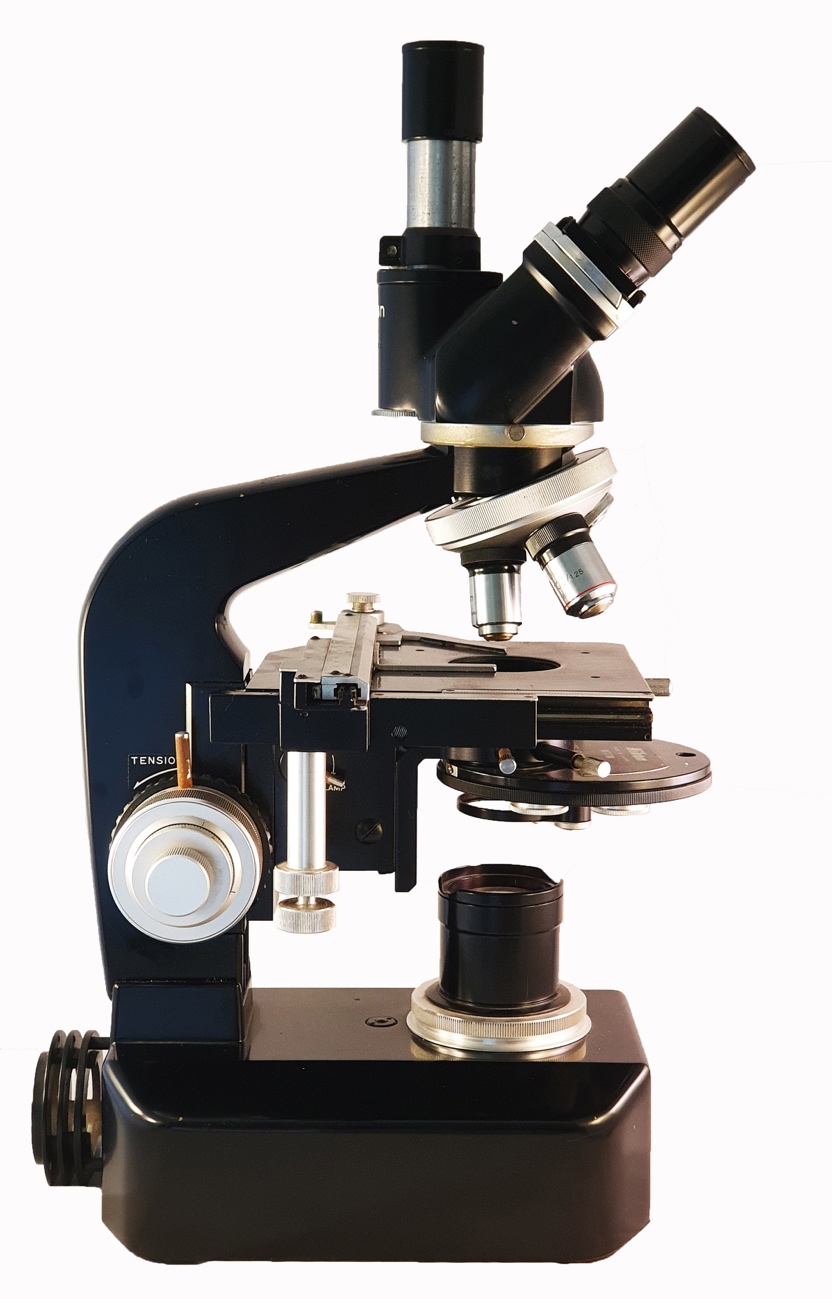 A close-up of a microscopeDescription automatically generated