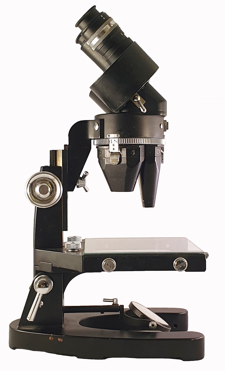 A close-up of a microscopeDescription automatically generated