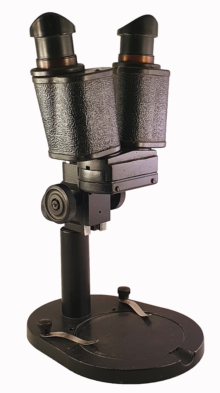 A close-up of a microscopeDescription automatically generated with low ...