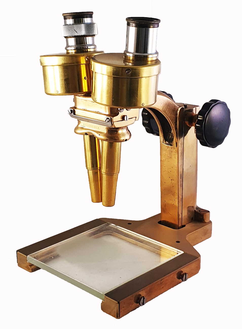 A close-up of a microscopeDescription automatically generated with ...