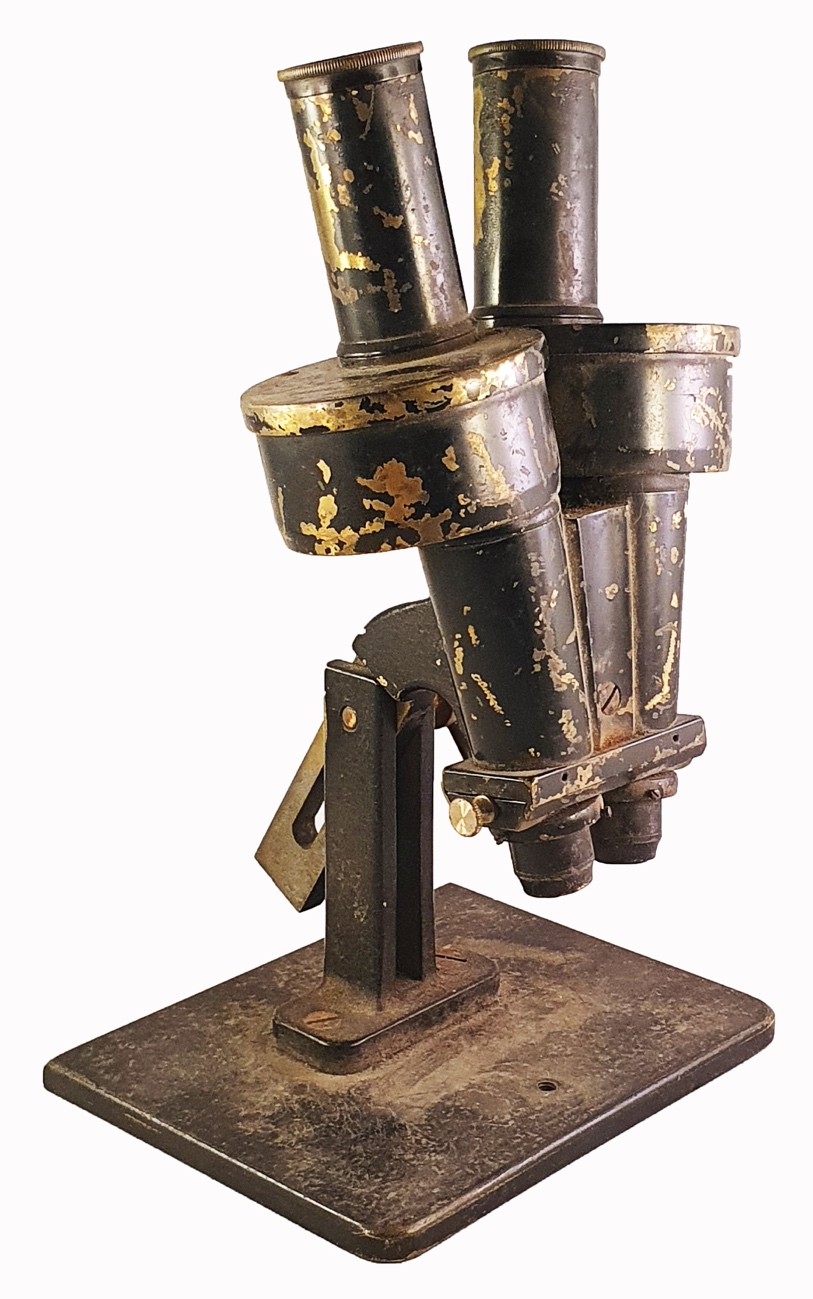 A close-up of a microscopeDescription automatically generated with ...