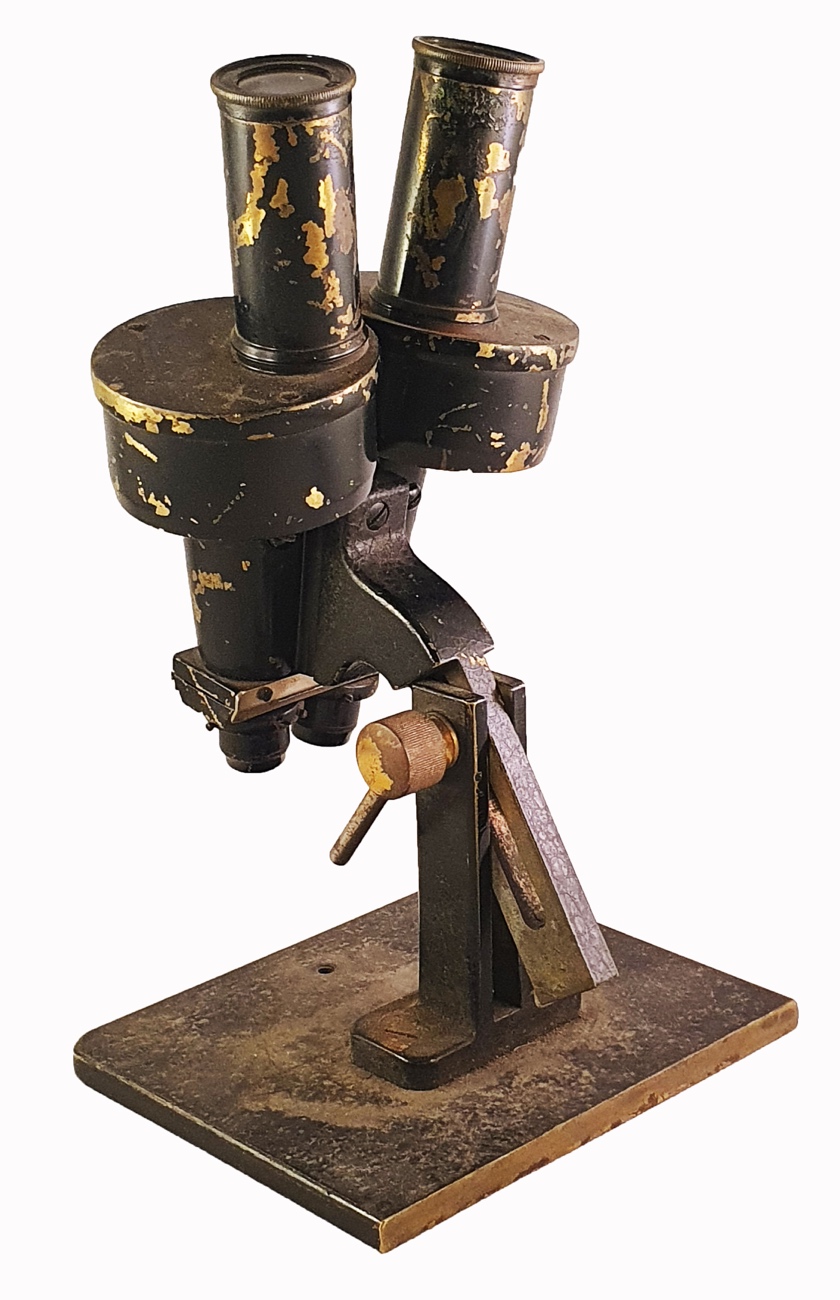 A close-up of a microscopeDescription automatically generated with ...