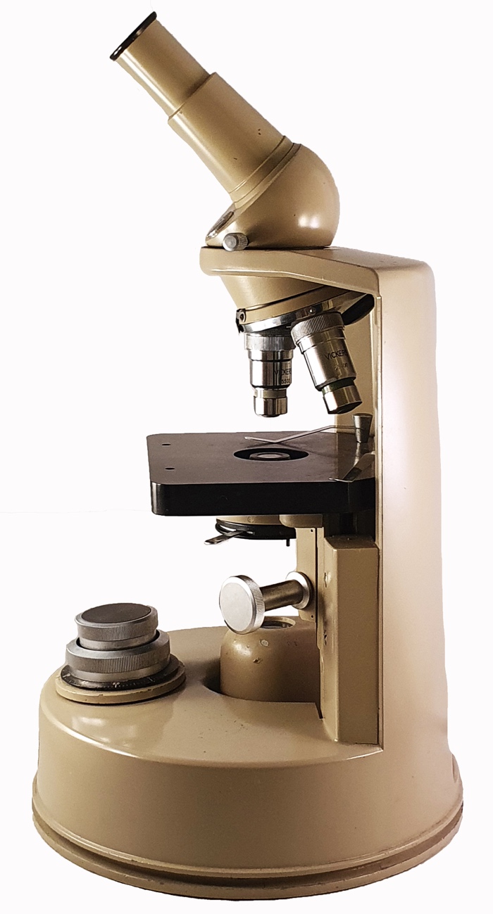 A close-up of a microscopeDescription automatically generated