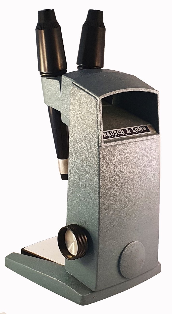 A close-up of a microscopeDescription automatically generated with ...
