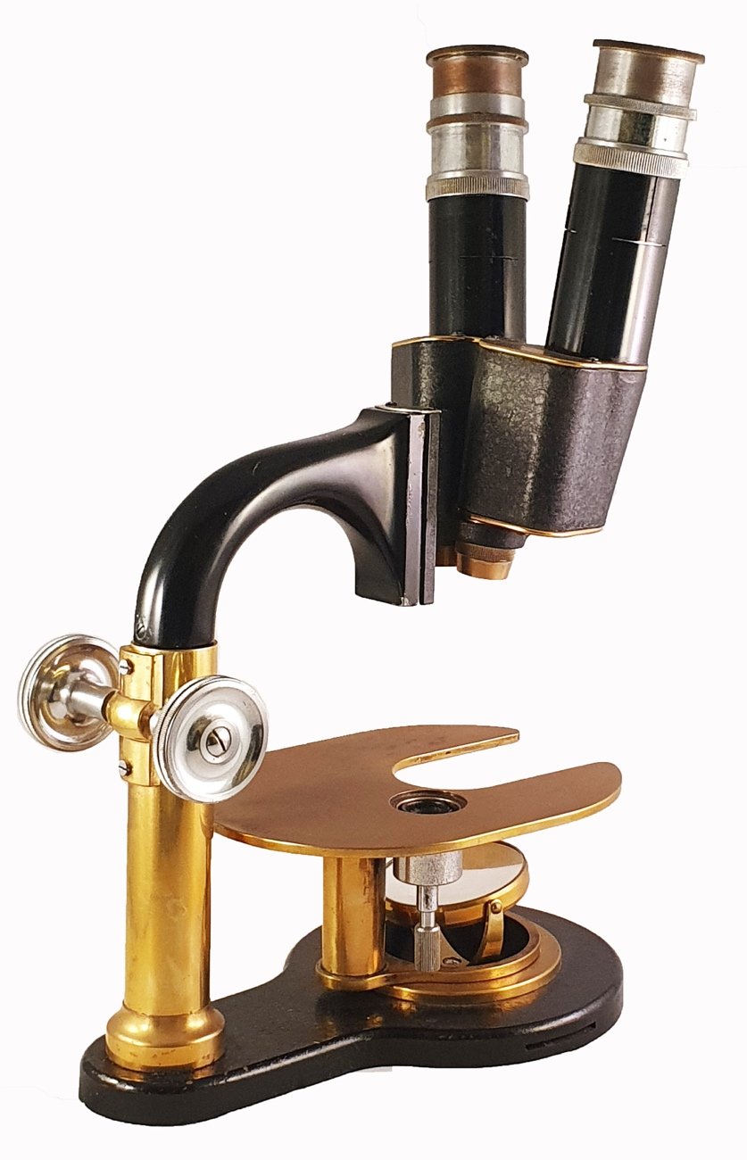 A close-up of a microscopeDescription automatically generated