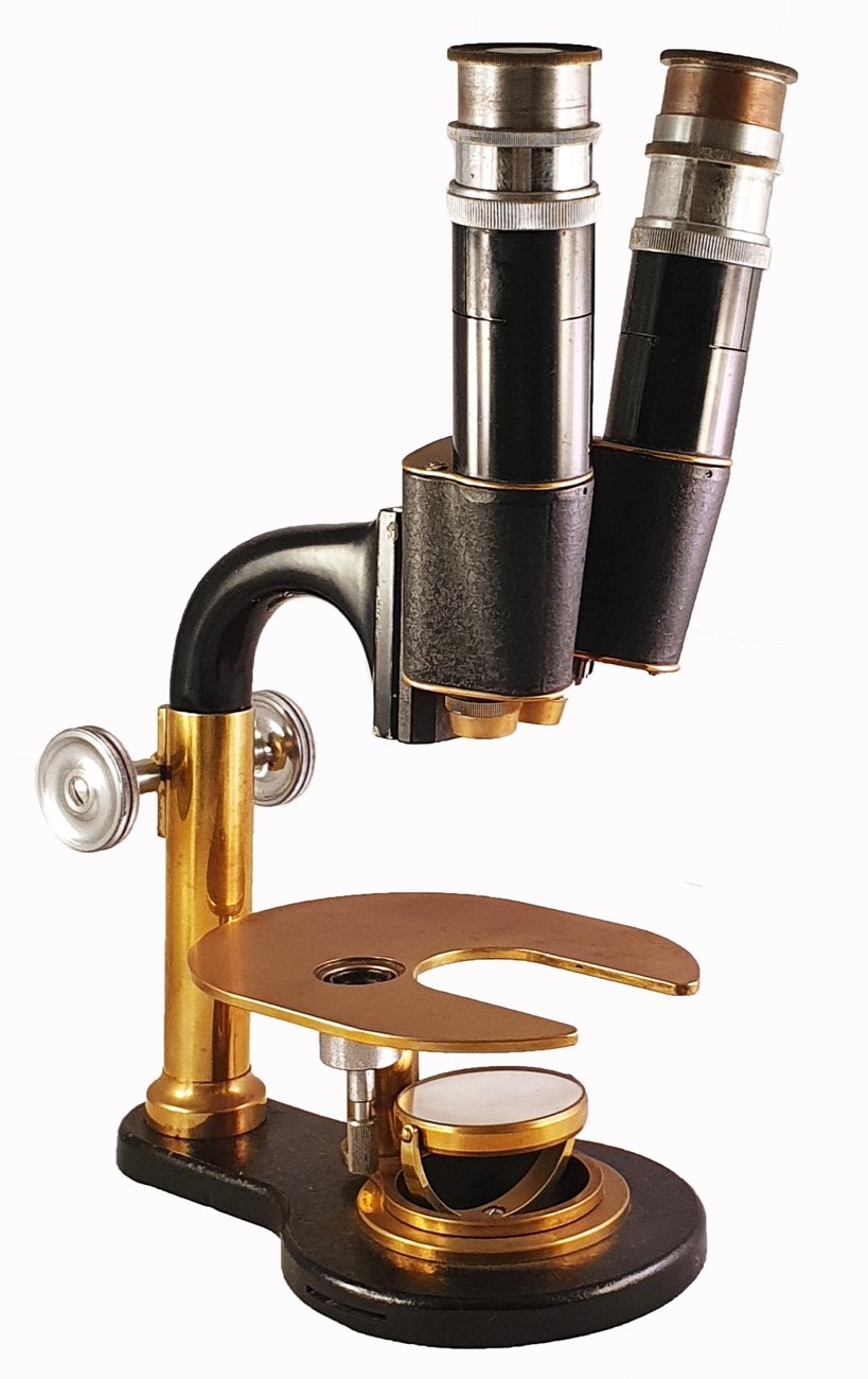 A close-up of a microscopeDescription automatically generated