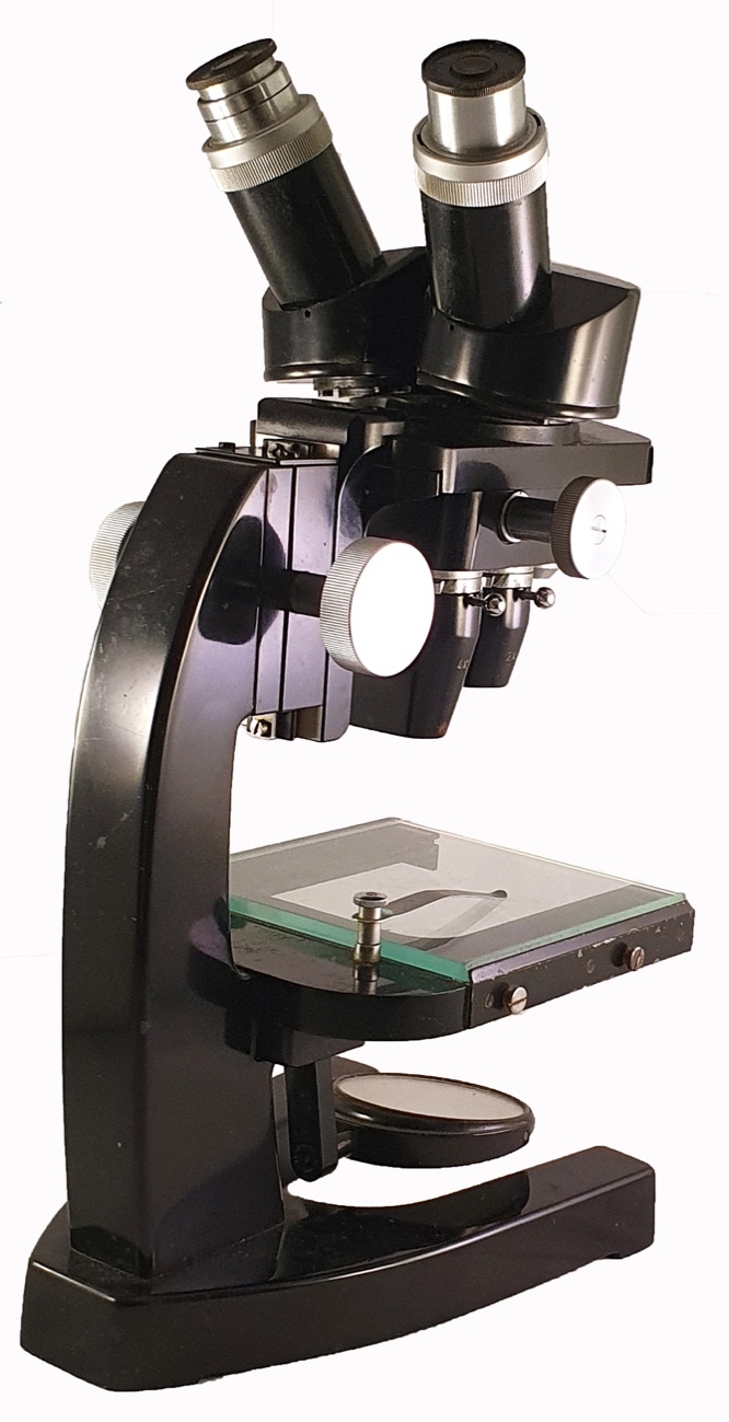 A close-up of a microscopeDescription automatically generated