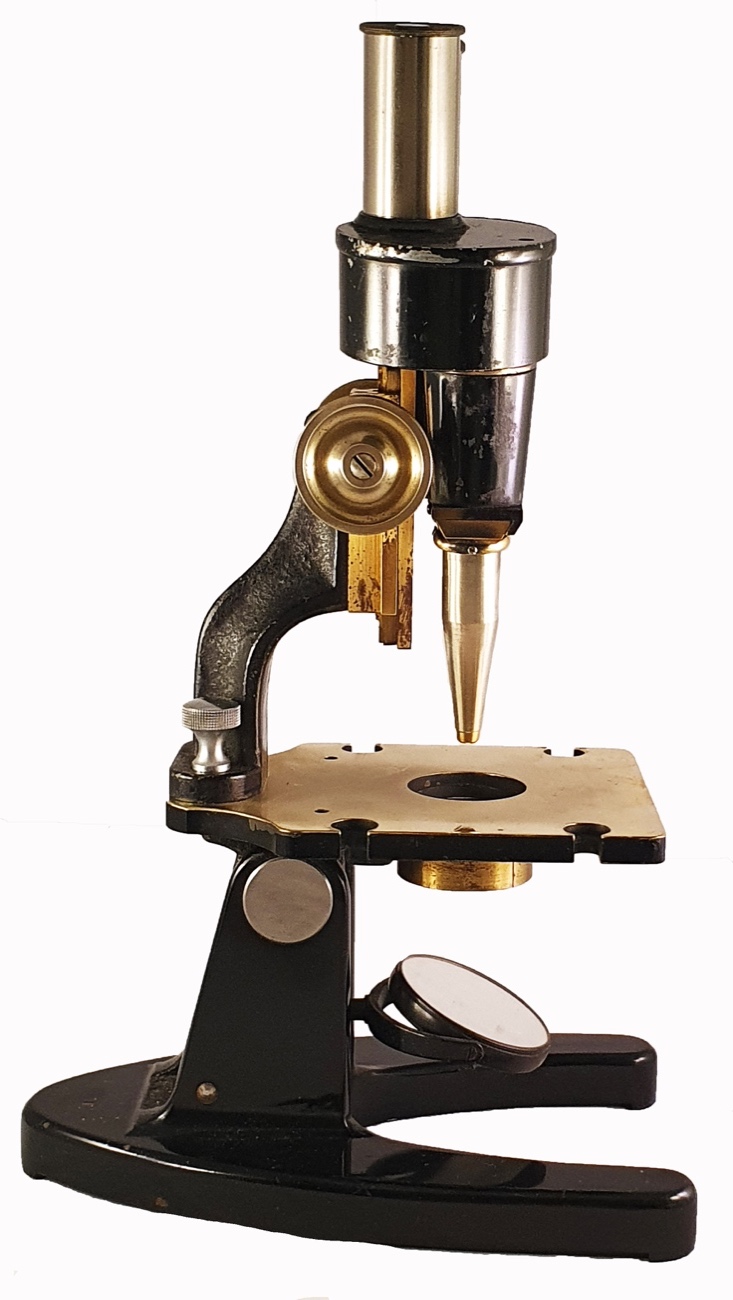 Close-up of a microscopeDescription automatically generated