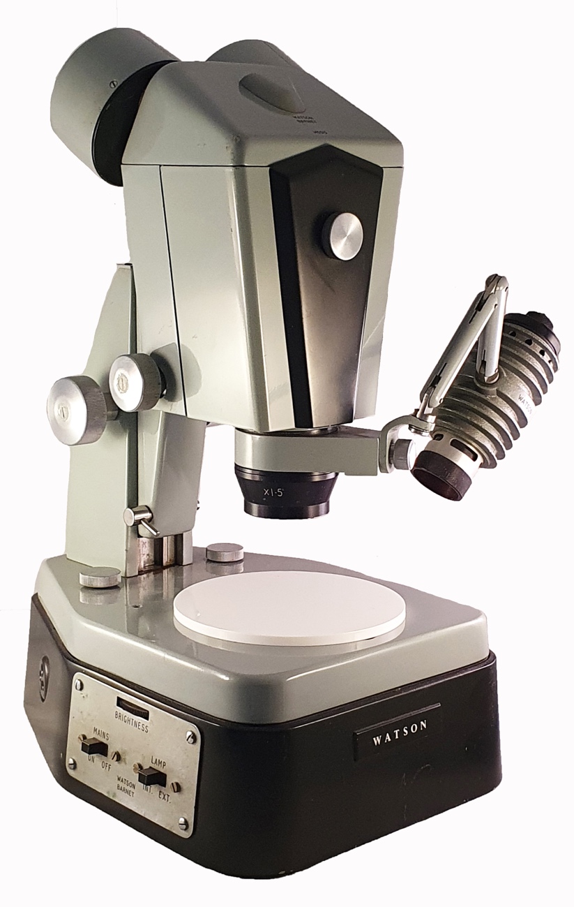 A close-up of a microscopeDescription automatically generated