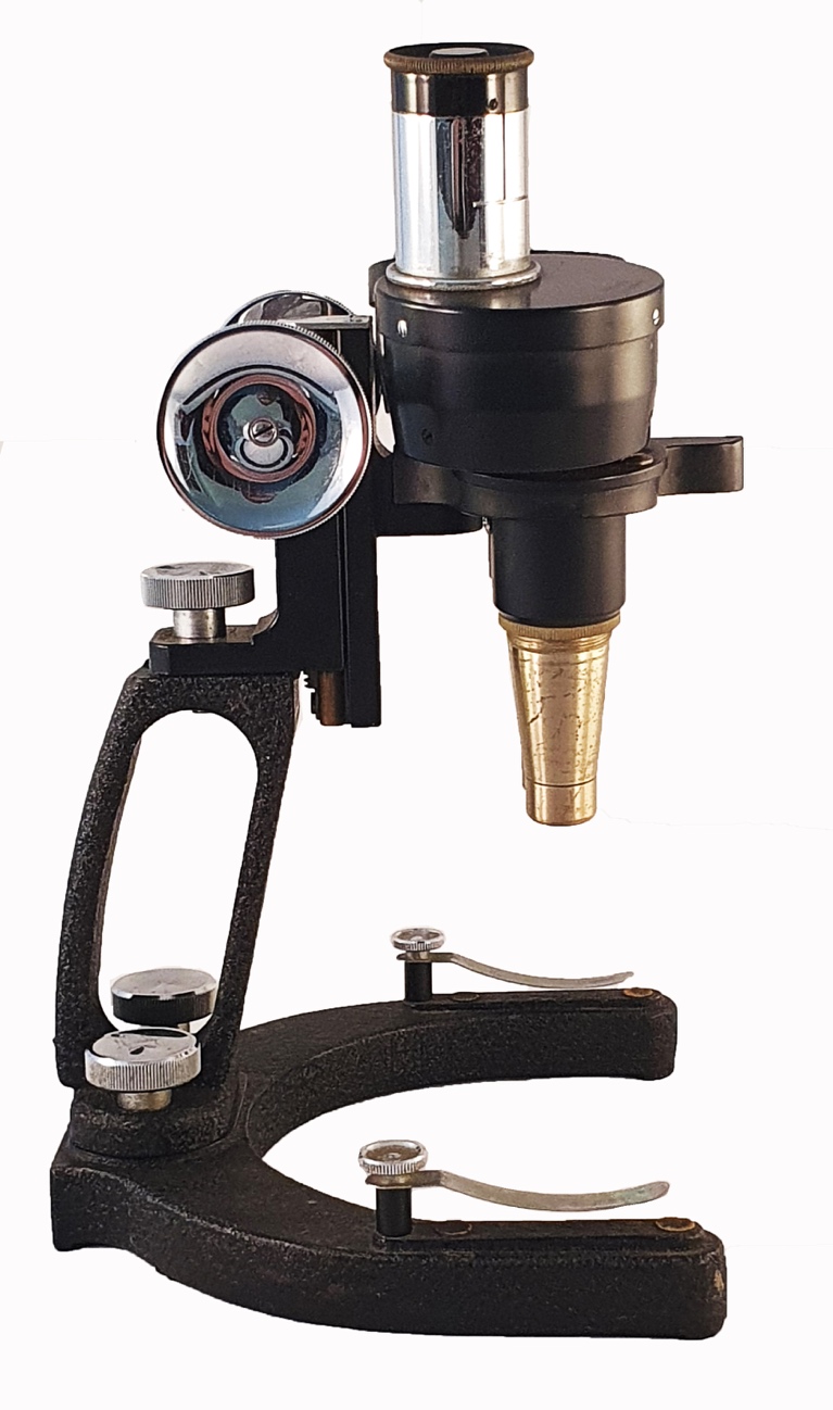 A close-up of a microscopeDescription automatically generated