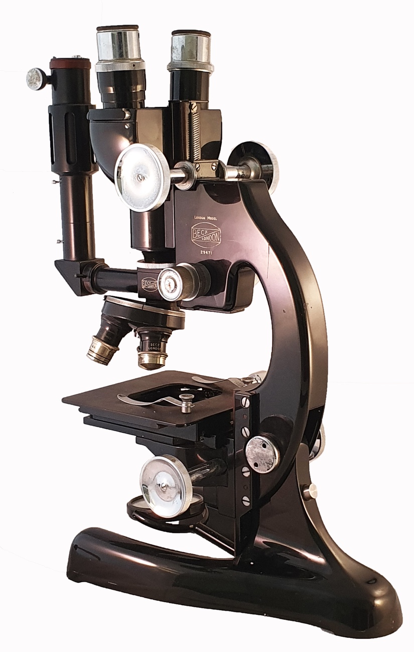 A close-up of a microscopeDescription automatically generated