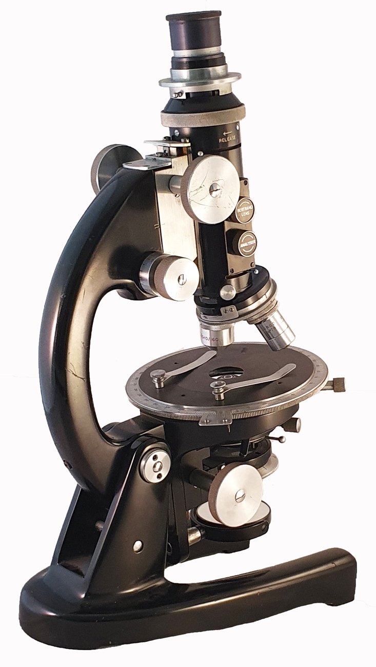 A close-up of a microscopeDescription automatically generated