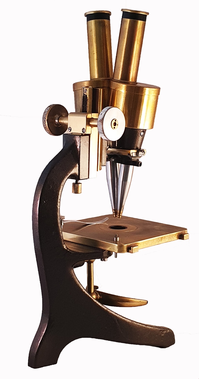 A close-up of a microscopeDescription automatically generated