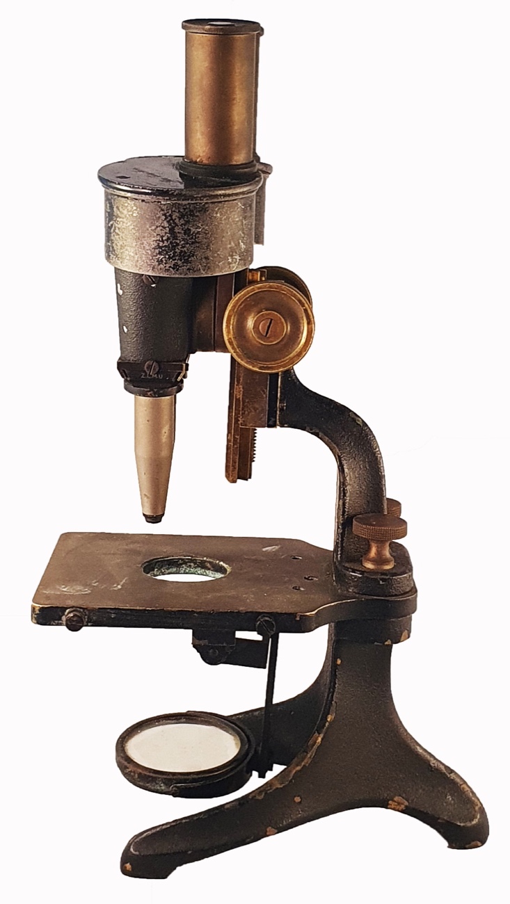 A close-up of a microscopeDescription automatically generated