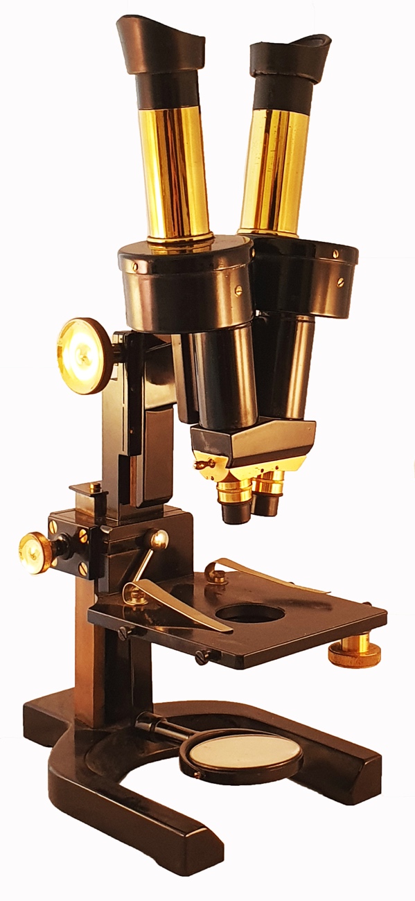 A close-up of a microscopeDescription automatically generated