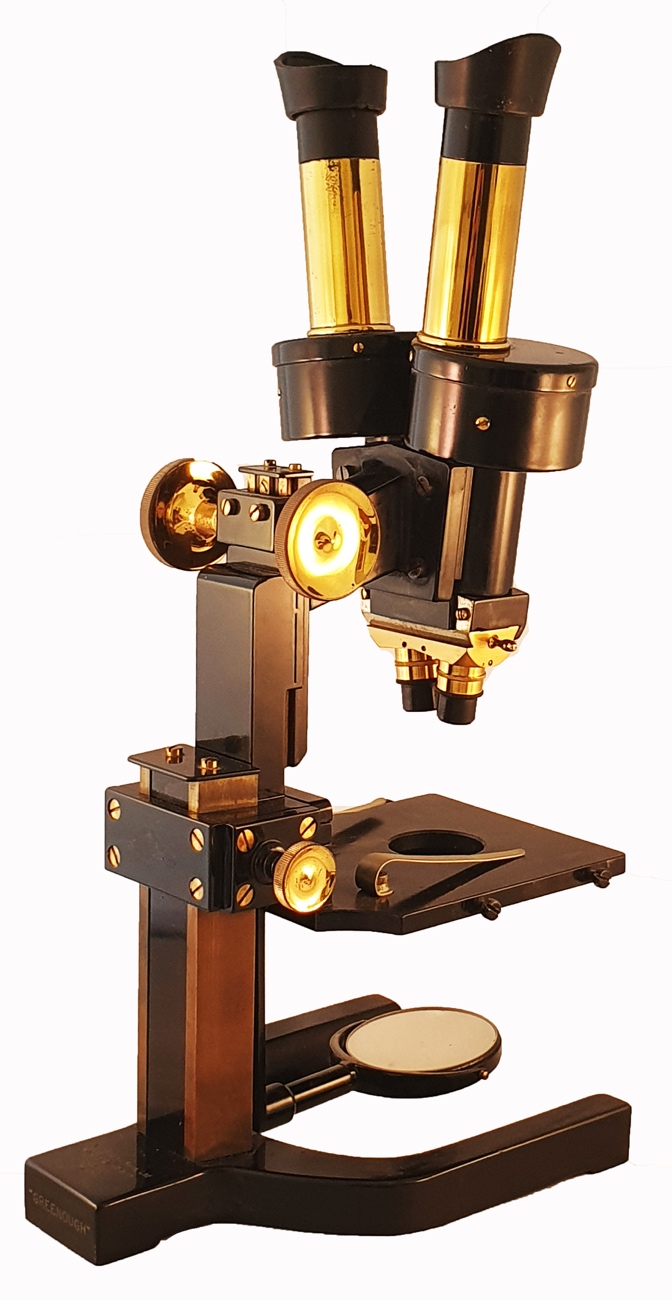 A close-up of a microscopeDescription automatically generated