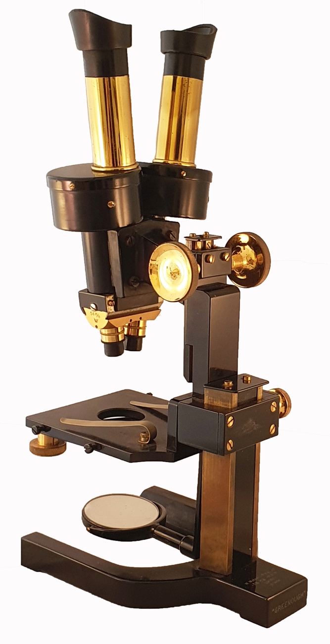 A close-up of a microscopeDescription automatically generated