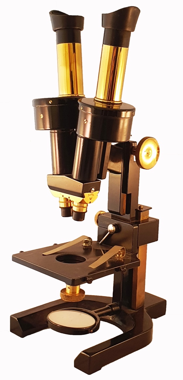 A close-up of a microscopeDescription automatically generated