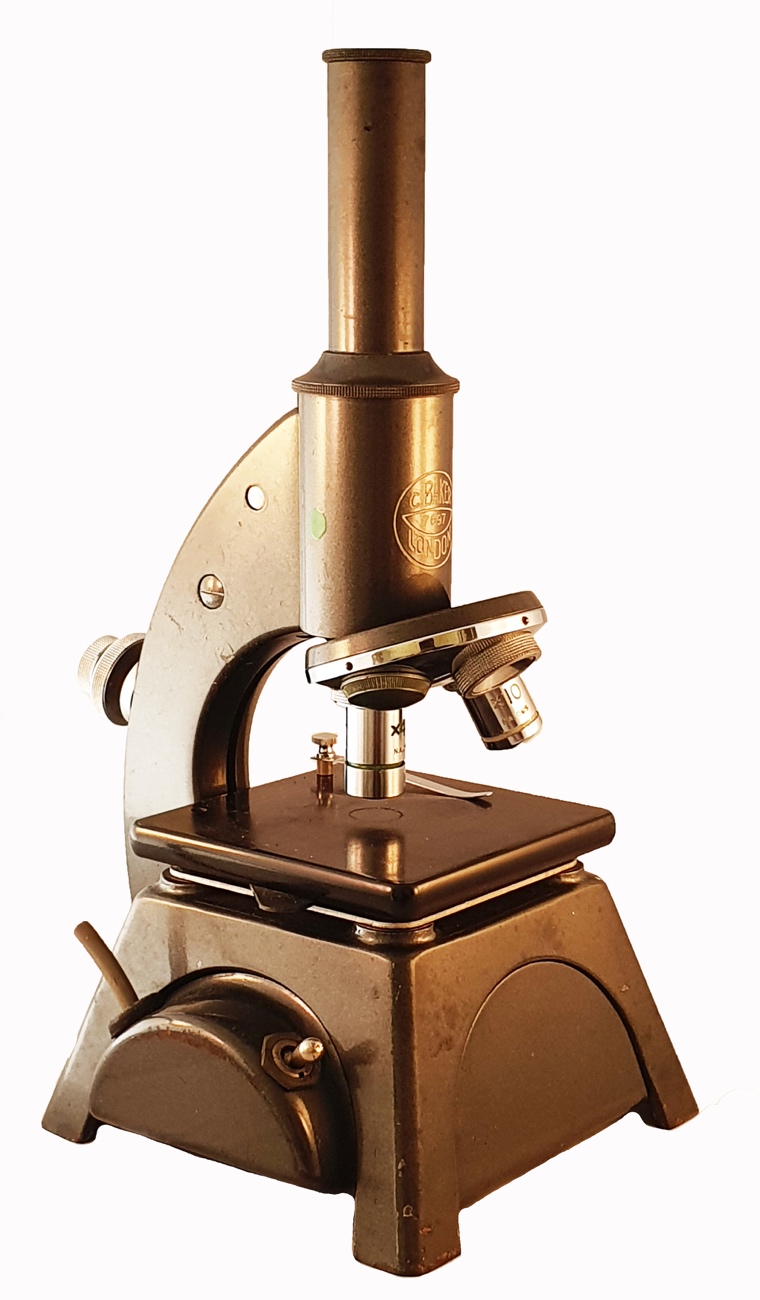 A close-up of a microscopeDescription automatically generated