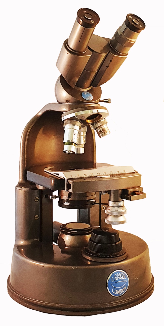 A close-up of a microscopeDescription automatically generated