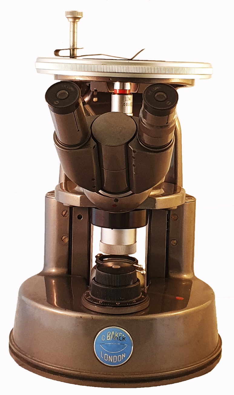 A close-up of a microscopeDescription automatically generated