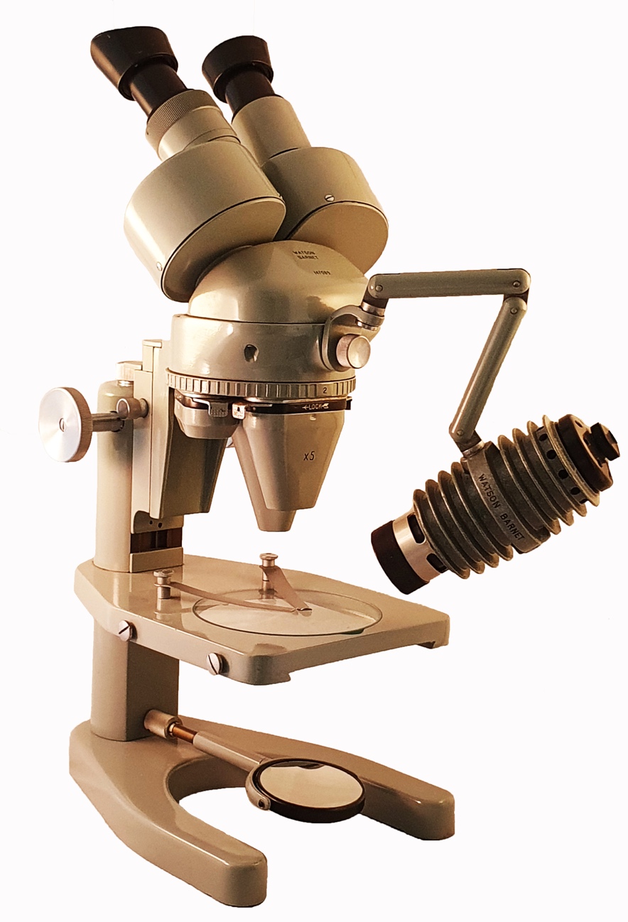 A close-up of a microscopeDescription automatically generated