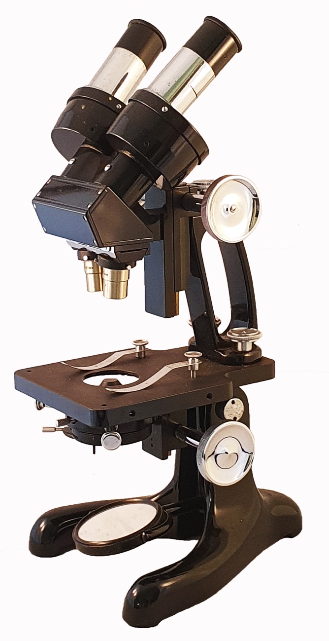 A close-up of a microscopeDescription automatically generated