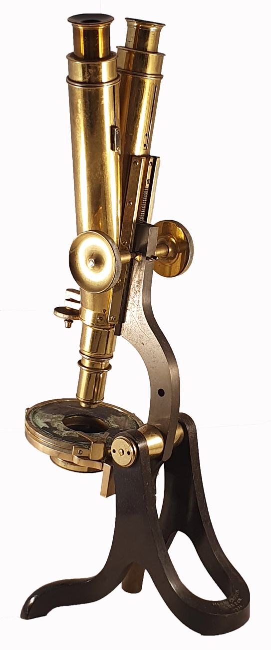 A close-up of a microscopeDescription automatically generated