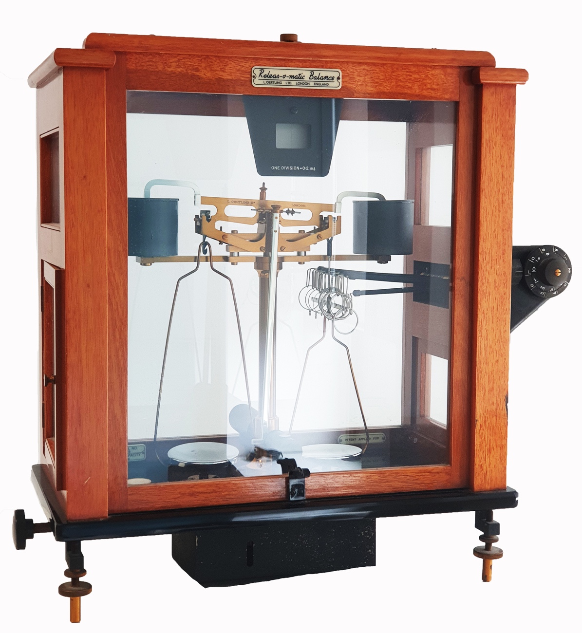 A wooden box with a glass frontDescription automatically generated